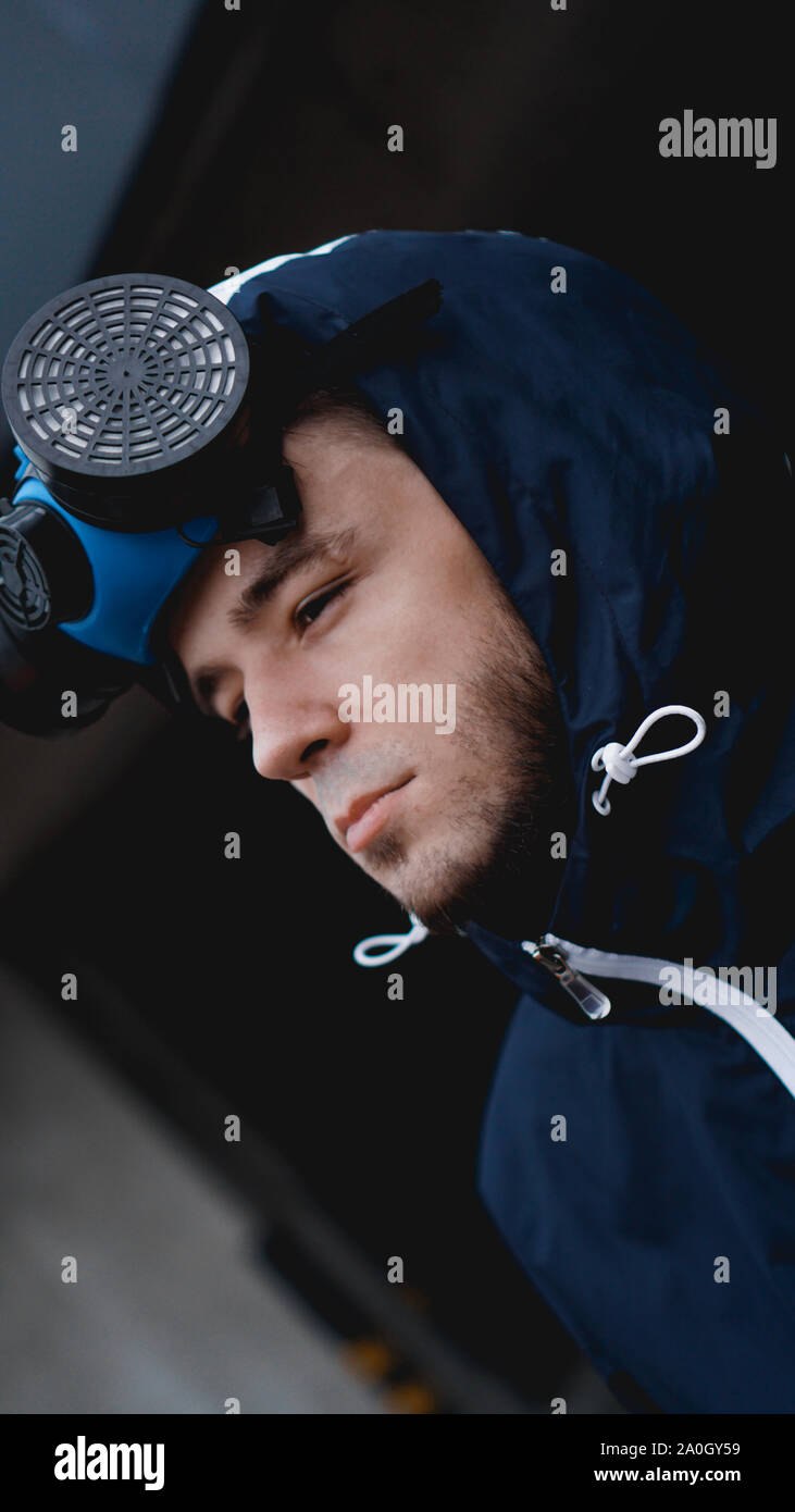 Protection respirator half mask for toxic gas.The man prepare to wear ...