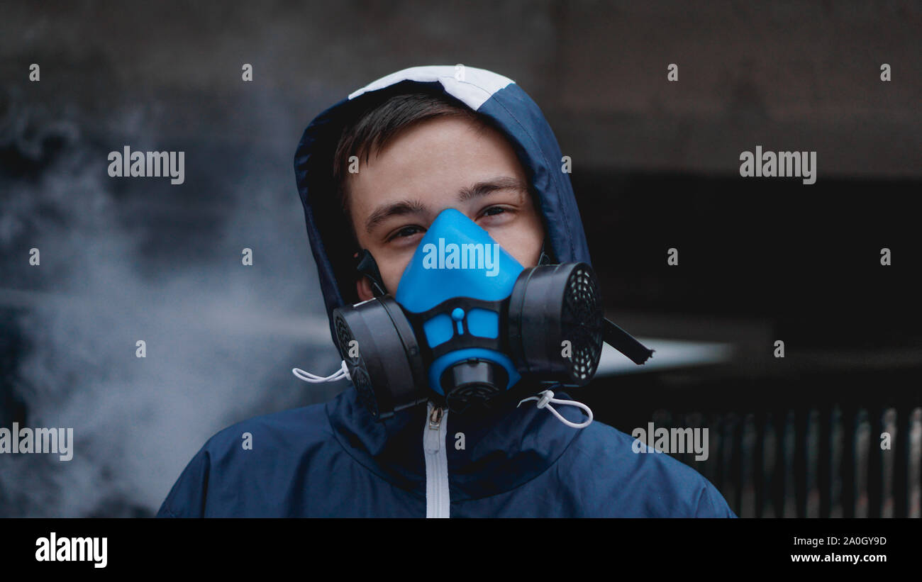 Protection respirator half mask for toxic gas.The man prepare to wear ...