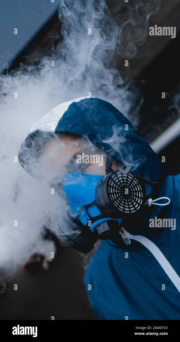 Protection respirator half mask for toxic gas.The man prepare to wear ...