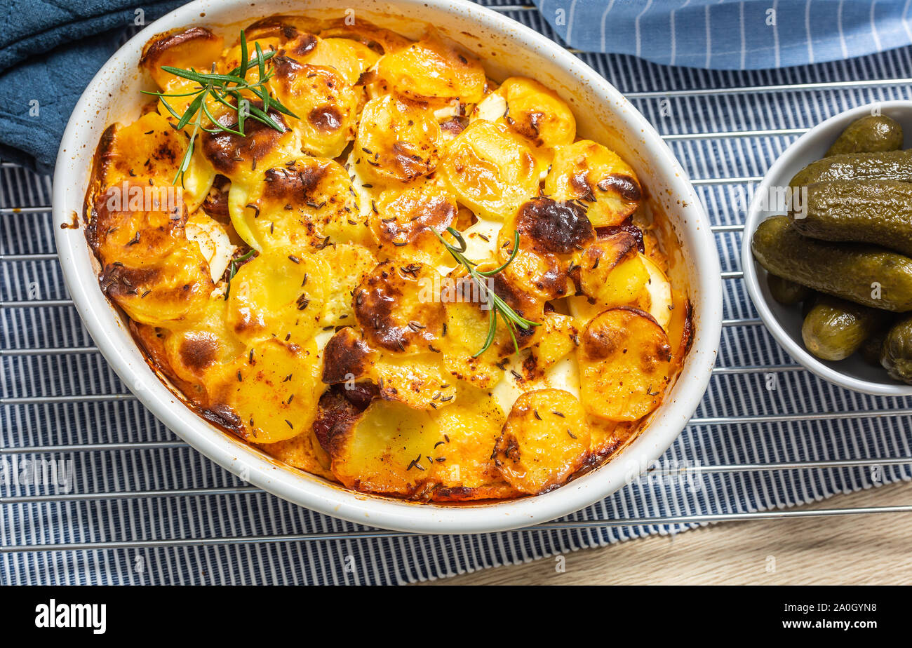 Roasted potatoes in baking dish traditional easten european food titled ...