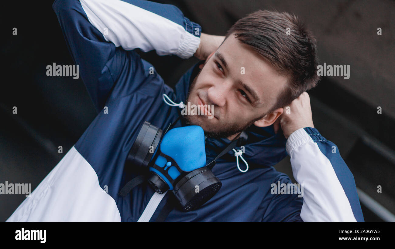 Protection respirator half mask for toxic gas.The man prepare to wear ...