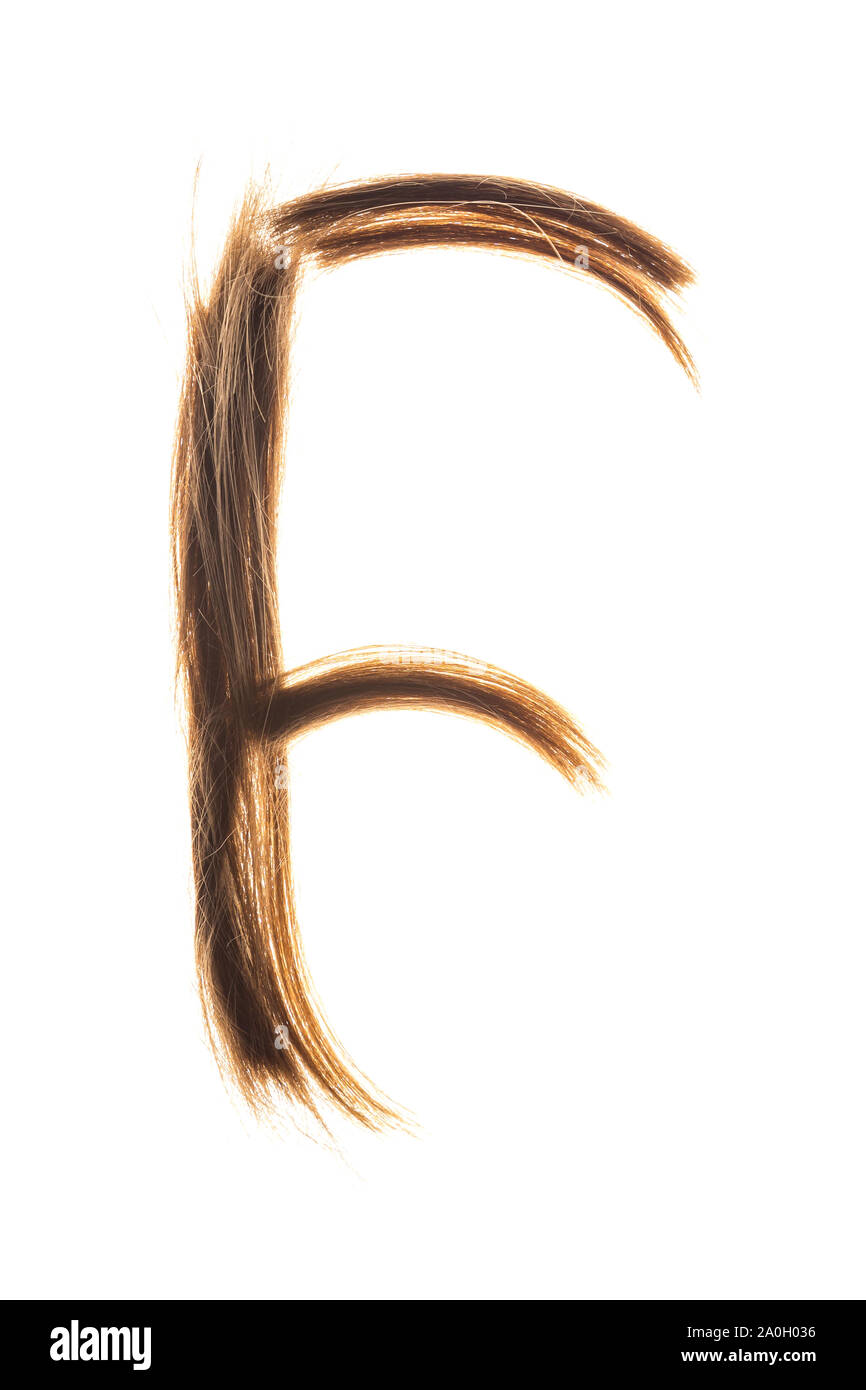 Letters made from woman hair capital F isolated on white background ...