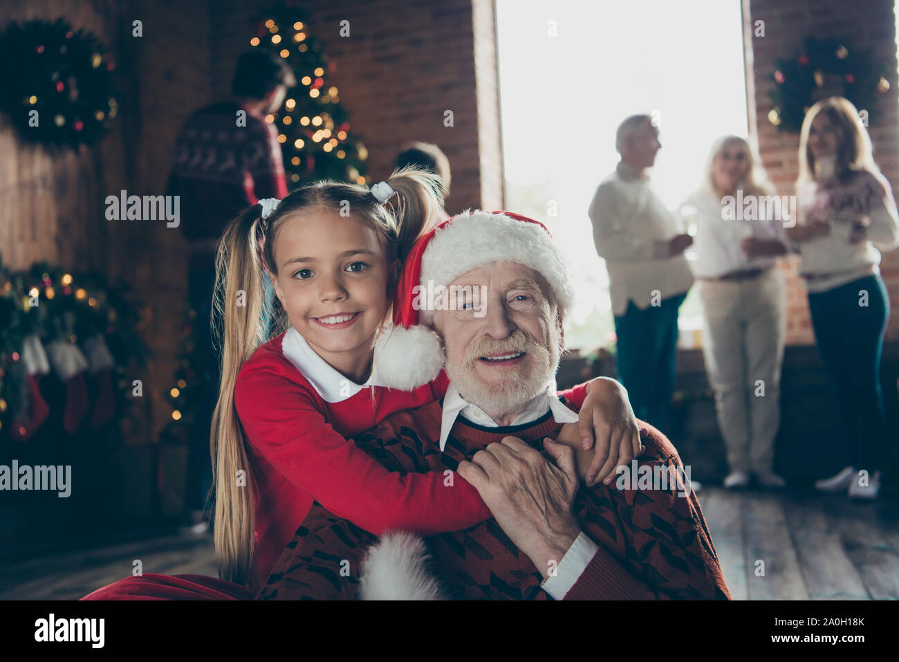 Teen hugging grandfather hi-res stock photography and images - Alamy