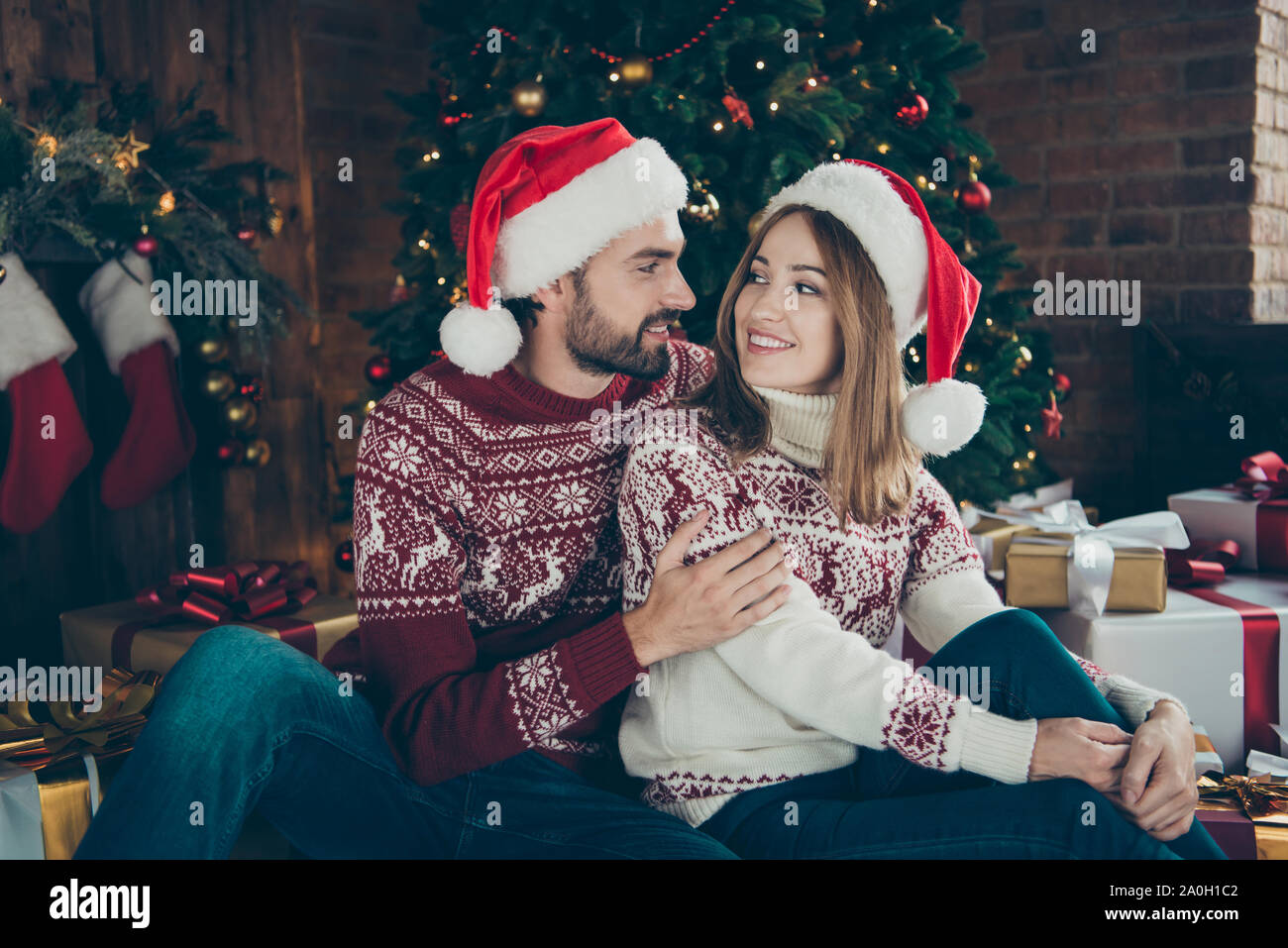 Portrait of two cheerful nice adorable people, married couple wearing ...