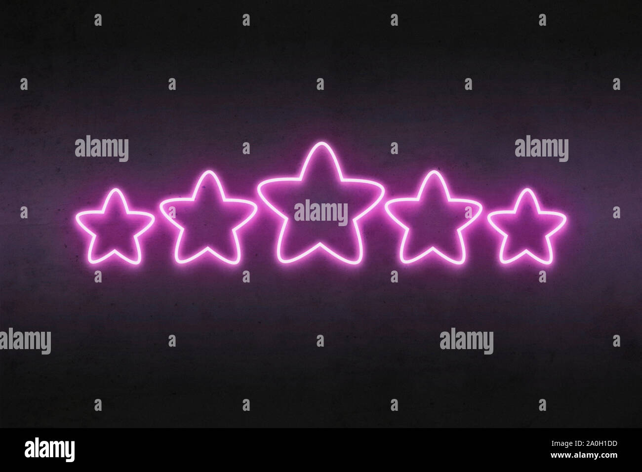 Purple rating stars on a dark wall glow with bright light Stock Photo ...