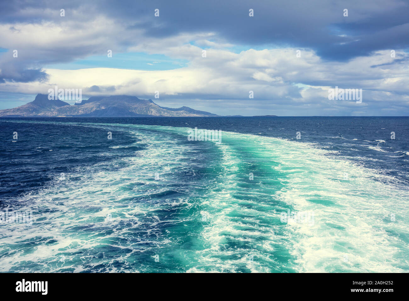 Island on the horizon. Rocks in the sea. Beautiful rocky sea landscape ...