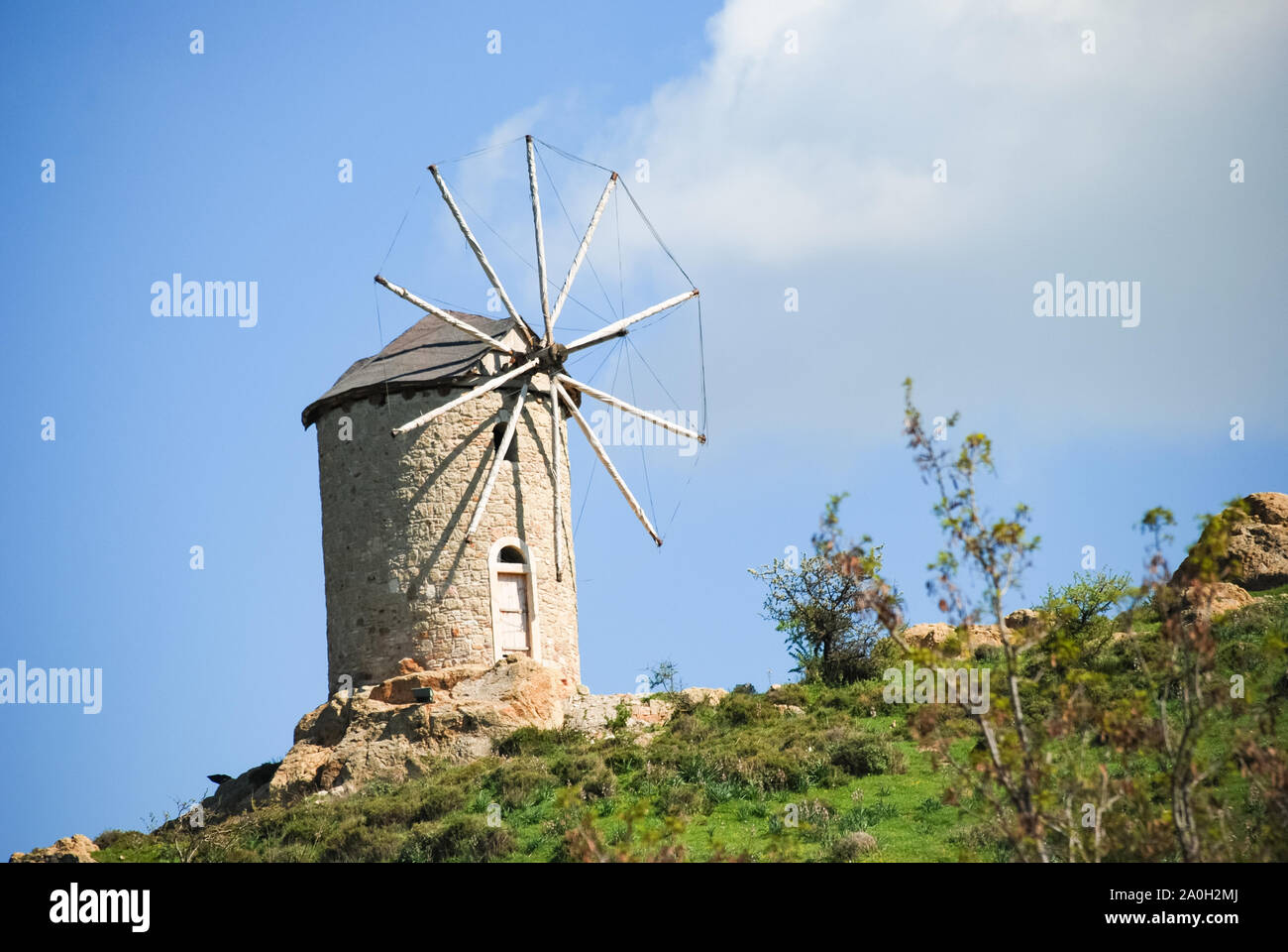 Windmill and Sunny sky at the hill of Foca Town in Izmir, Turkey Stock ...
