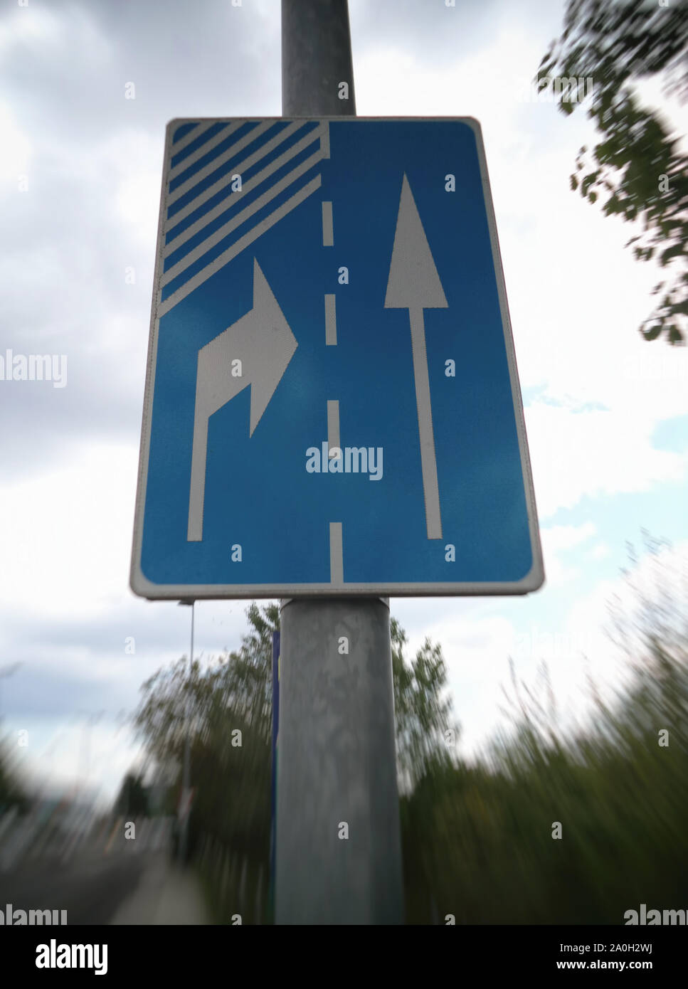 Traffic sign, blurred image Stock Photo - Alamy