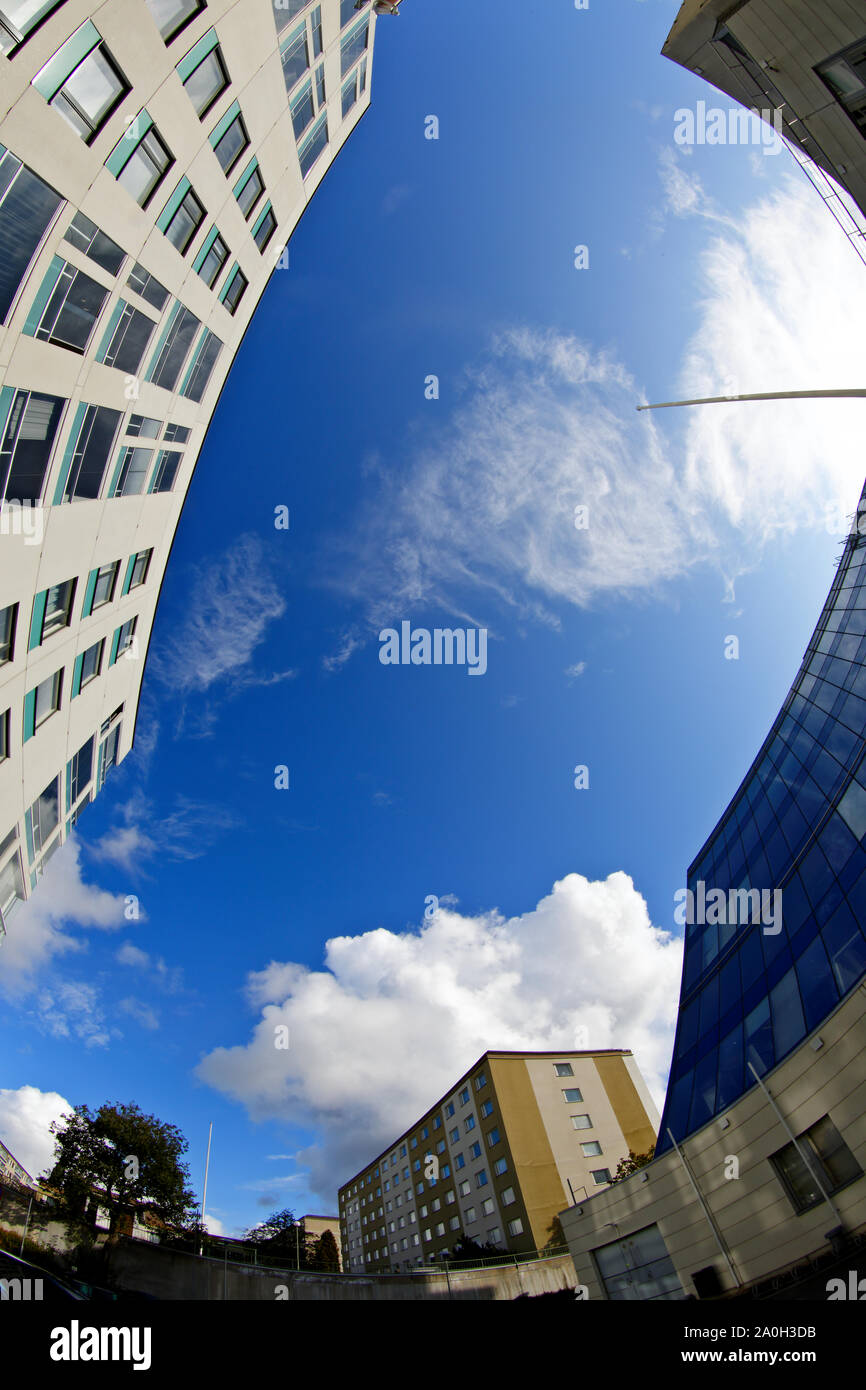 A fish eye picture of some high rise buildings in a town Stock Photo ...