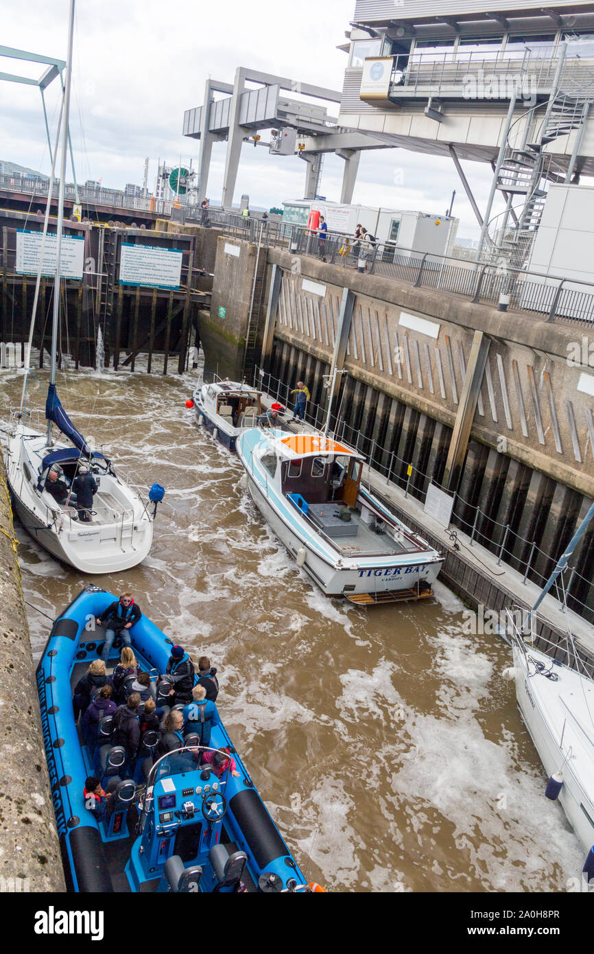 An assortment of boats waiting in one of the locks that give access to ...