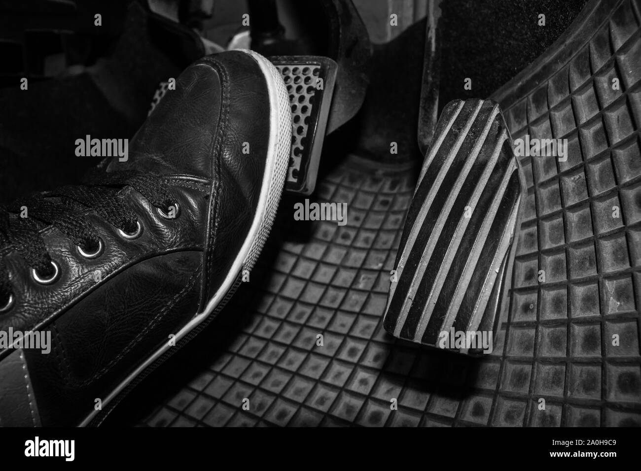 Foot while driving pedal to control the speed of the drive Stock Photo ...