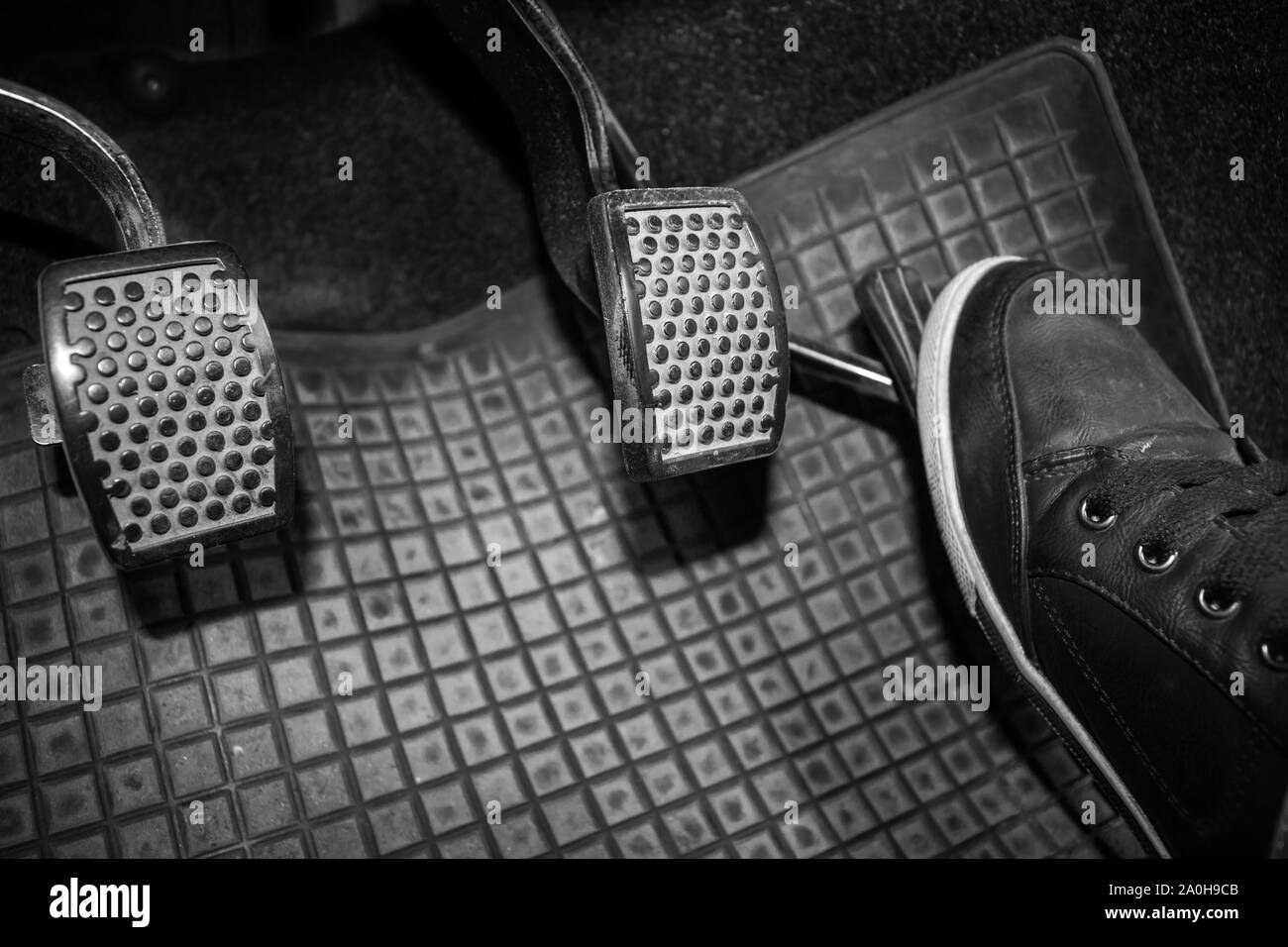 Foot while driving pedal to control the speed of the drive Stock Photo ...