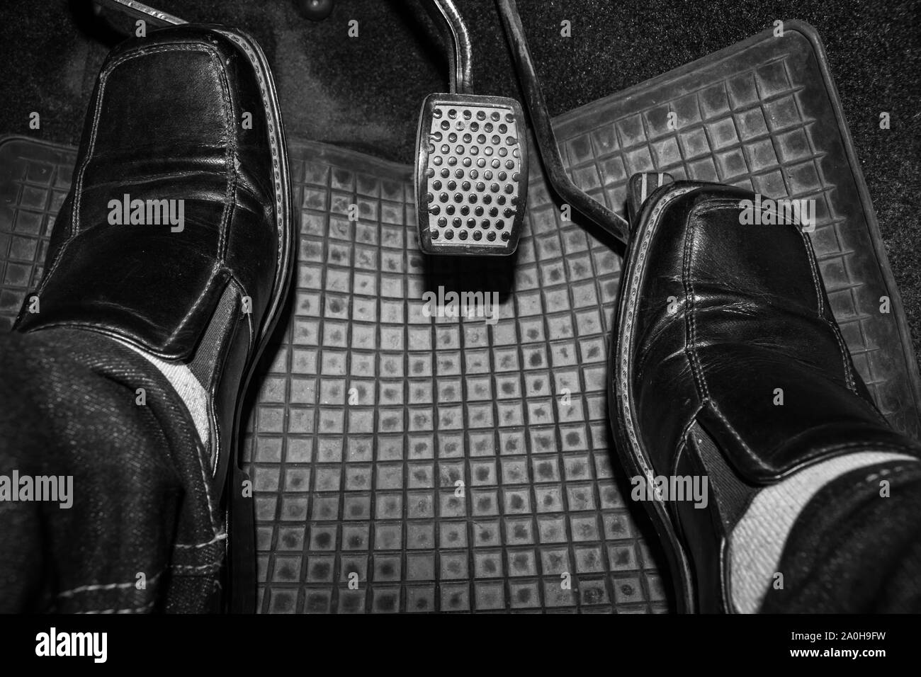 Foot while driving pedal to control the speed of the drive Stock Photo ...