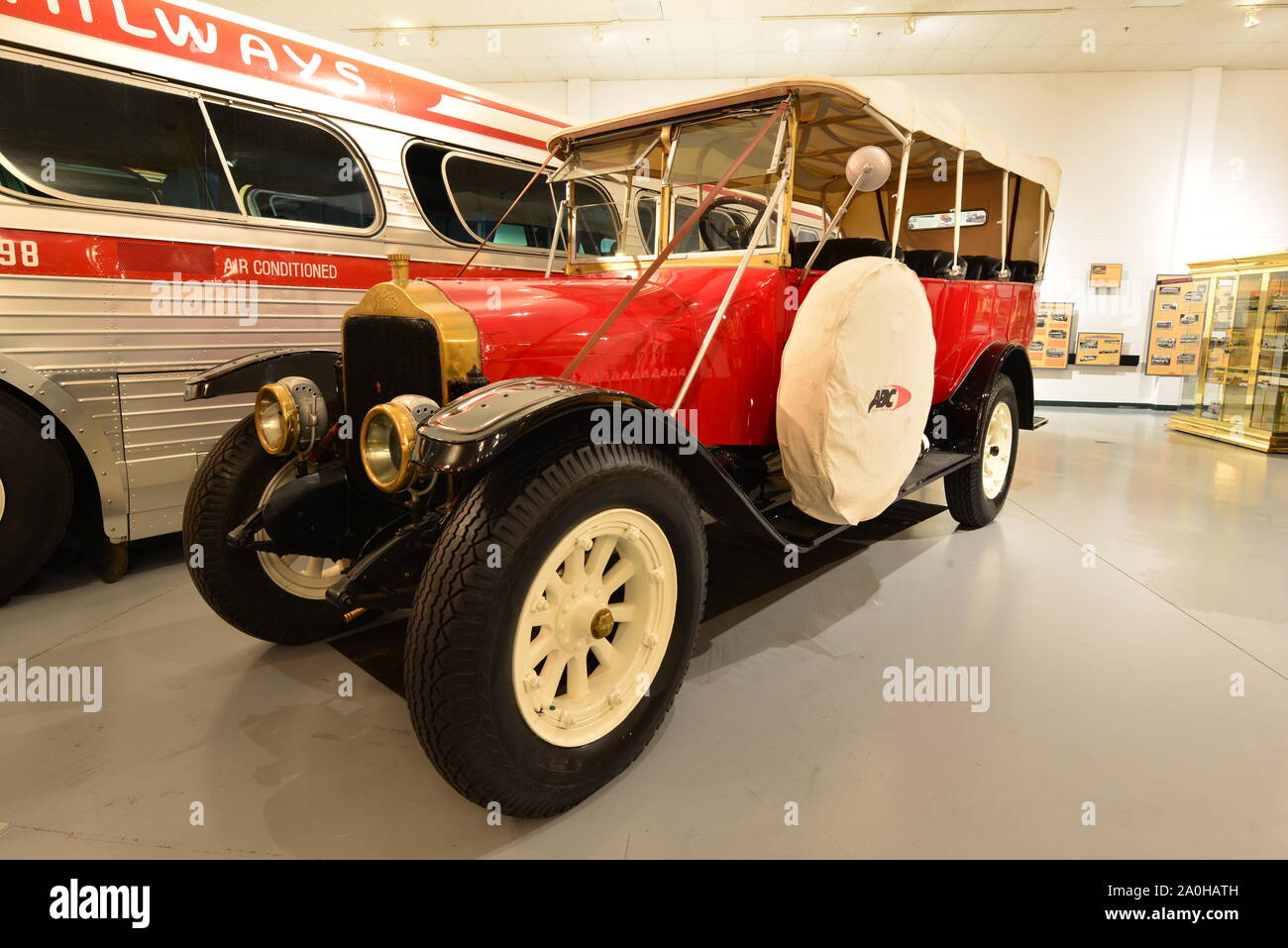 A White convertible vintage mini bus Stock Photo - Alamy