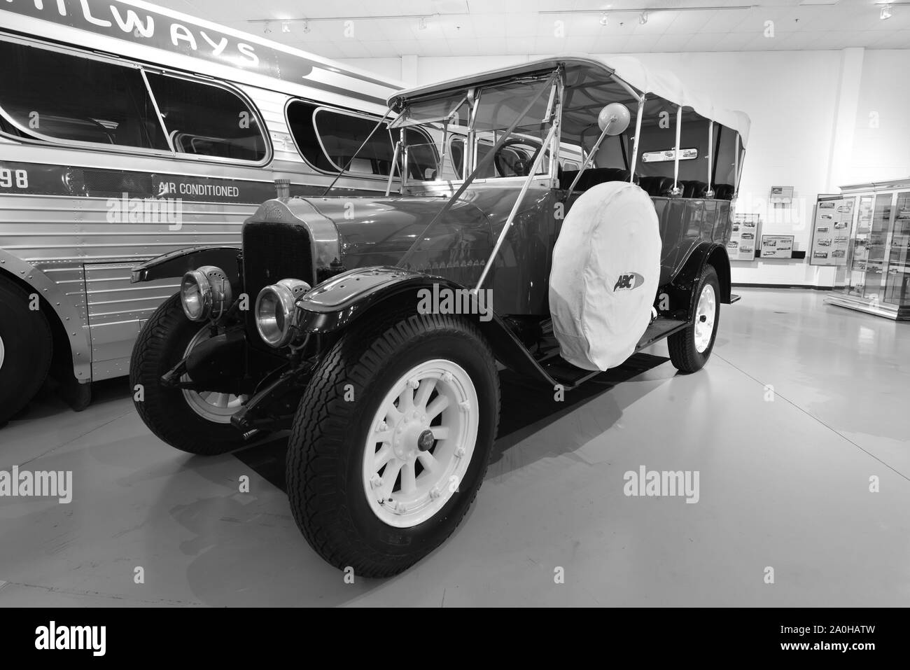 A White convertible vintage mini bus Stock Photo - Alamy