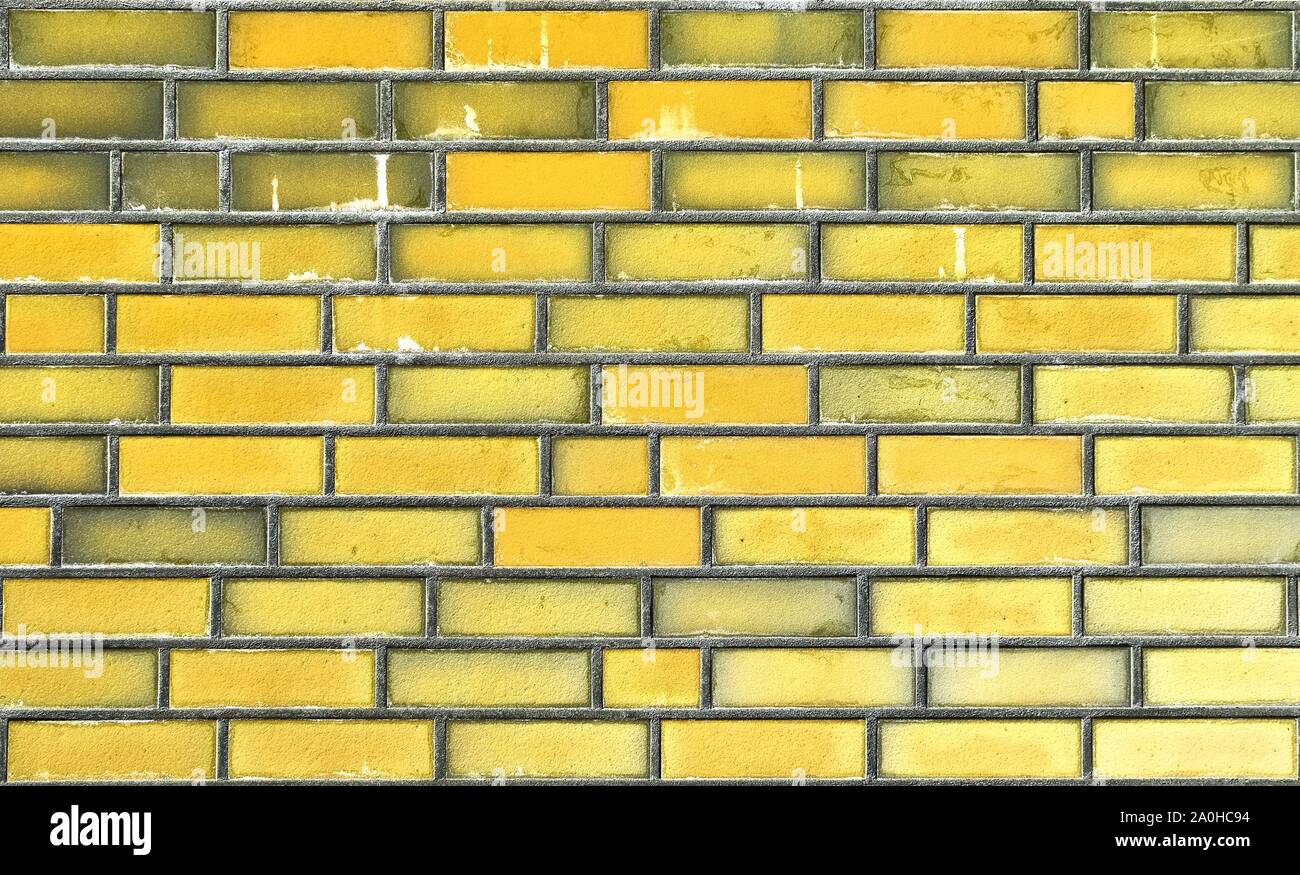 Aged and weathered yellow brick walls on historical buildings found all ...
