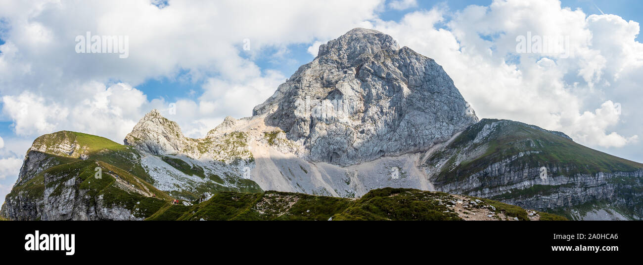 Western Wall of Mount Mangart (2677m) with Hikers in the Julian Alps ...