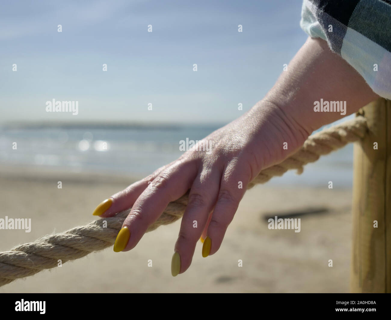 Woman hold rope hi-res stock photography and images - Alamy