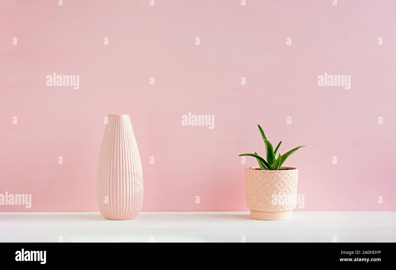 Geometric composition of pink ceramic vases. The concept of minimalism ...