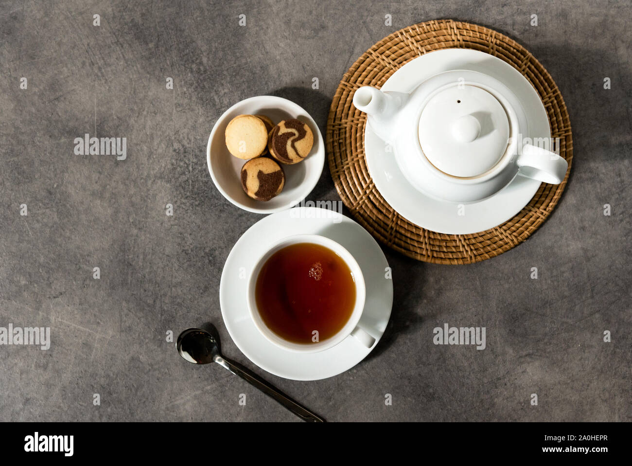 White porcelain tea cup and teapot, English tea on table, Afternoon Tea ...