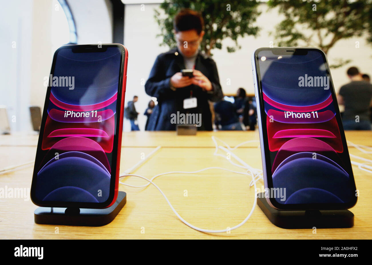 A pair of iPhone 11s on display during the Apple iPhone 11 launch at ...