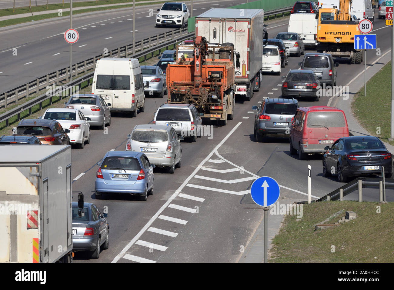 Vilnius, Lithuania - April 18: Traffic, cars on highway road in Vilnius ...
