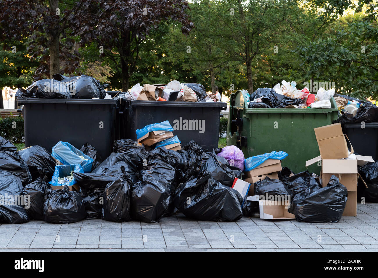 Huge Garbage Piles Next To The Dumpster After City Fair Stacks Of Litter Bags Overflow Trash