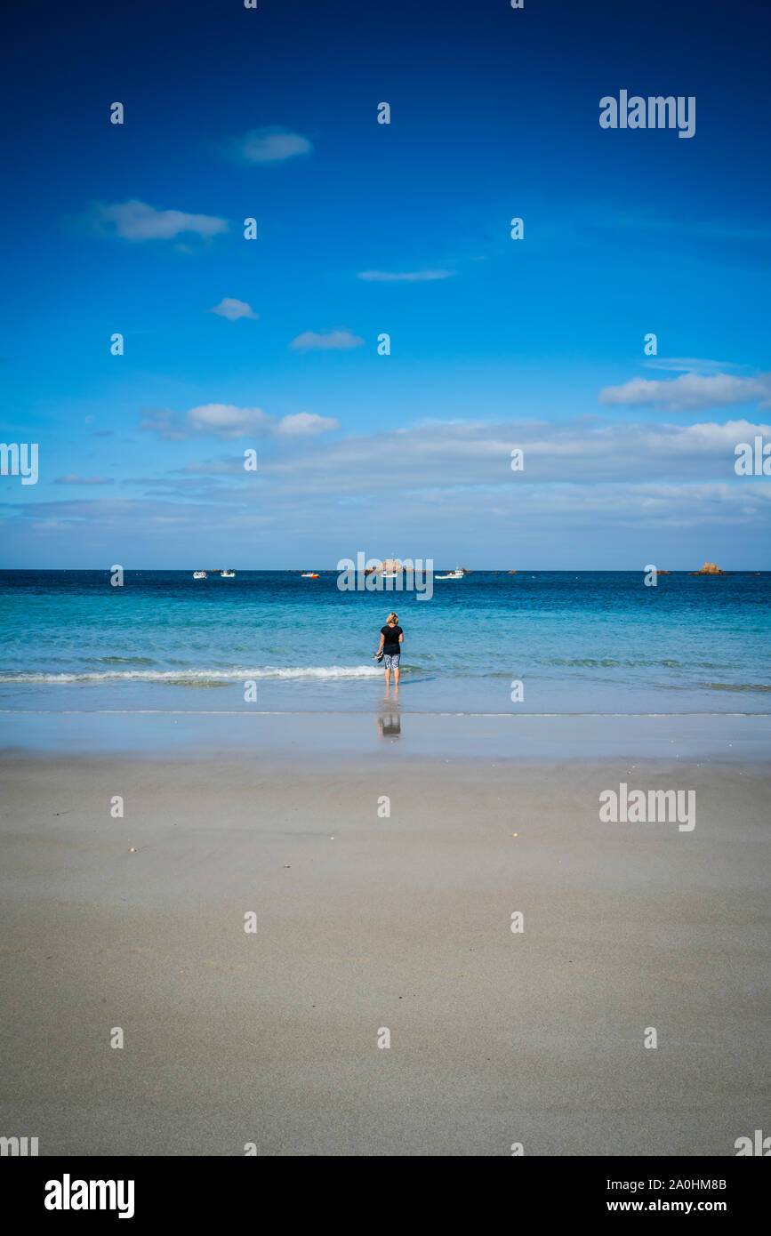 Beautiful sun drenched Cobo Bay on the west coast of the island of ...