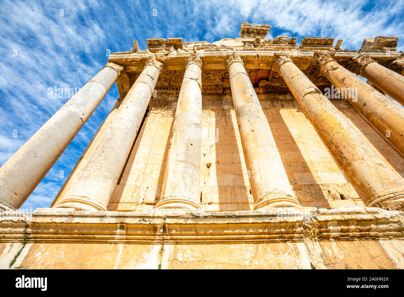 Columns of ancient Roman temple of Bacchus and blue sky in the ...