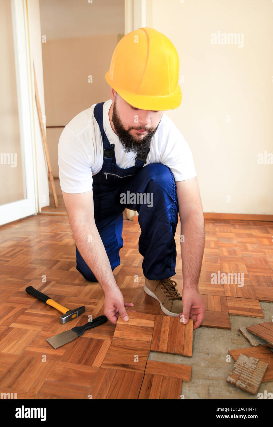 Construction worker and constructor is working on renovation of ...