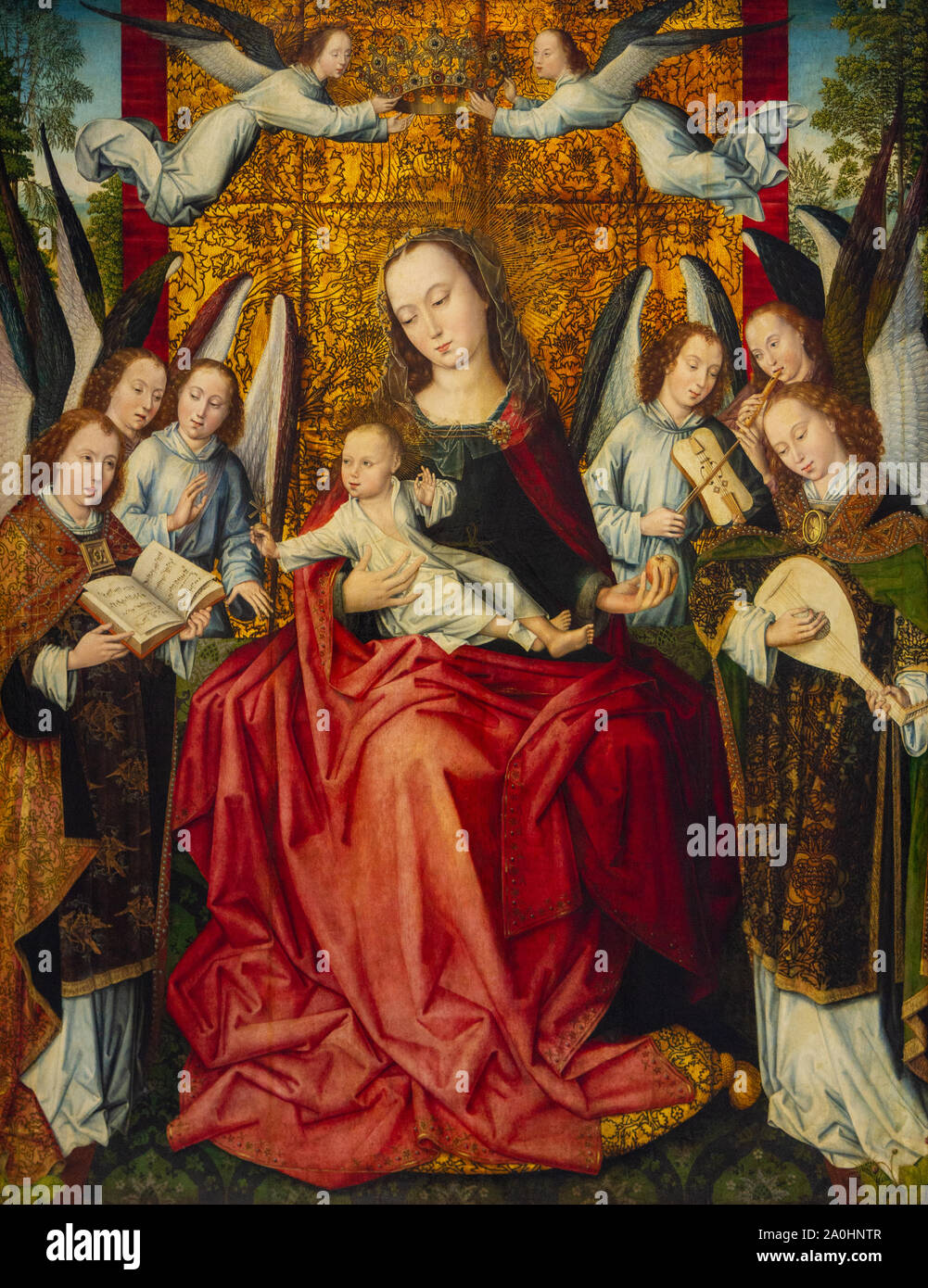 Virgin Mary with Infant Jesus surrounded by angels singing and playing ...