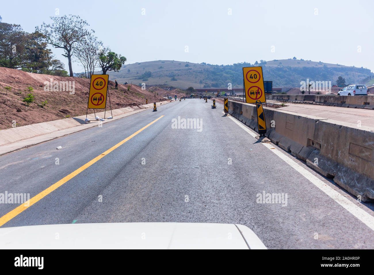 Road highway construction warning signs concrete barriers traffic ...