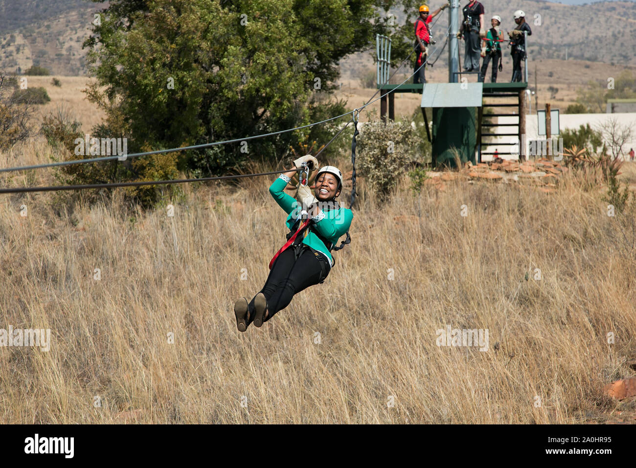 Adult man on zip line hi-res stock photography and images - Alamy