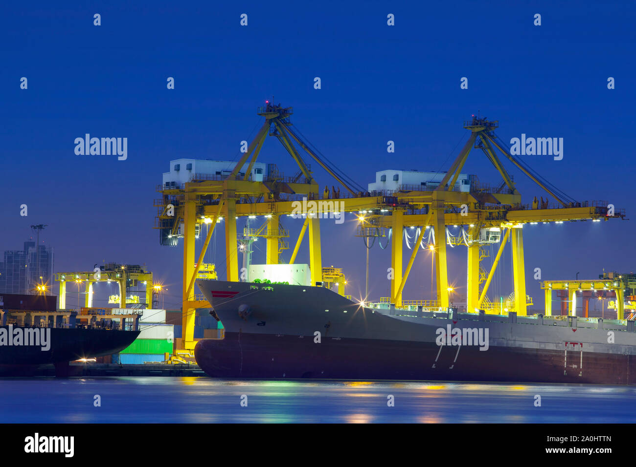 beautiful lighting of container ship in port use for import,export and ...