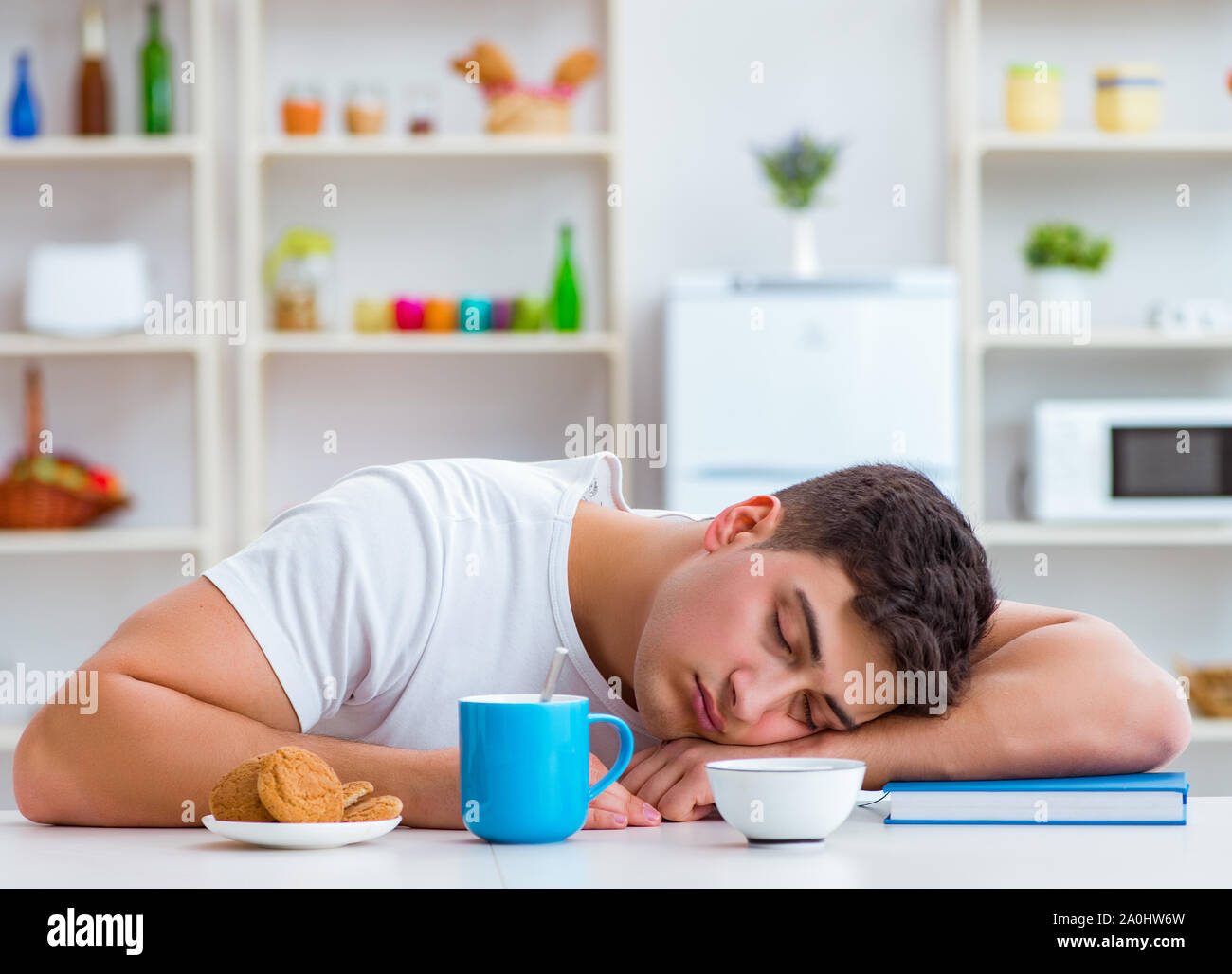 The man falling asleep during his breakfast after overtime work Stock ...