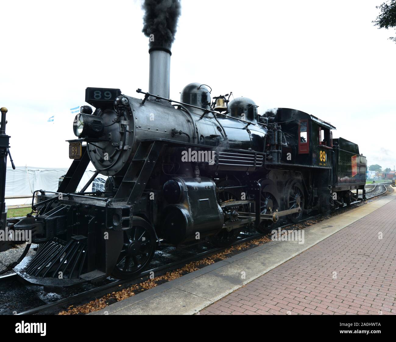 An American steam engine puffing smoke Stock Photo - Alamy