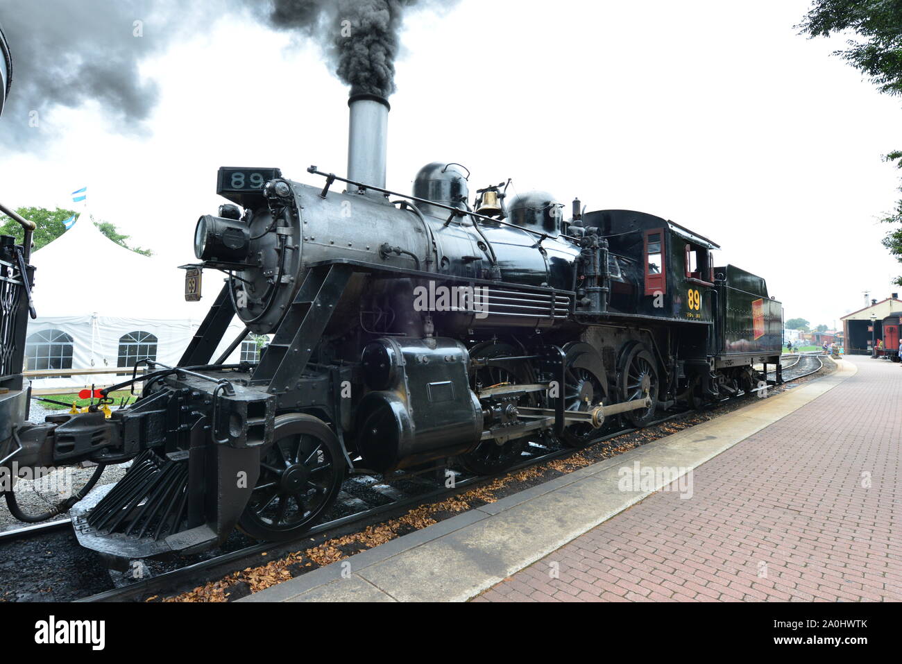 An American steam engine puffing smoke Stock Photo - Alamy