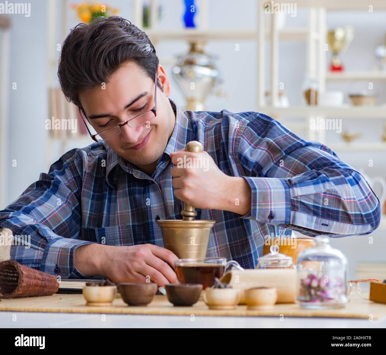 The professional tea expert trying new brews Stock Photo - Alamy