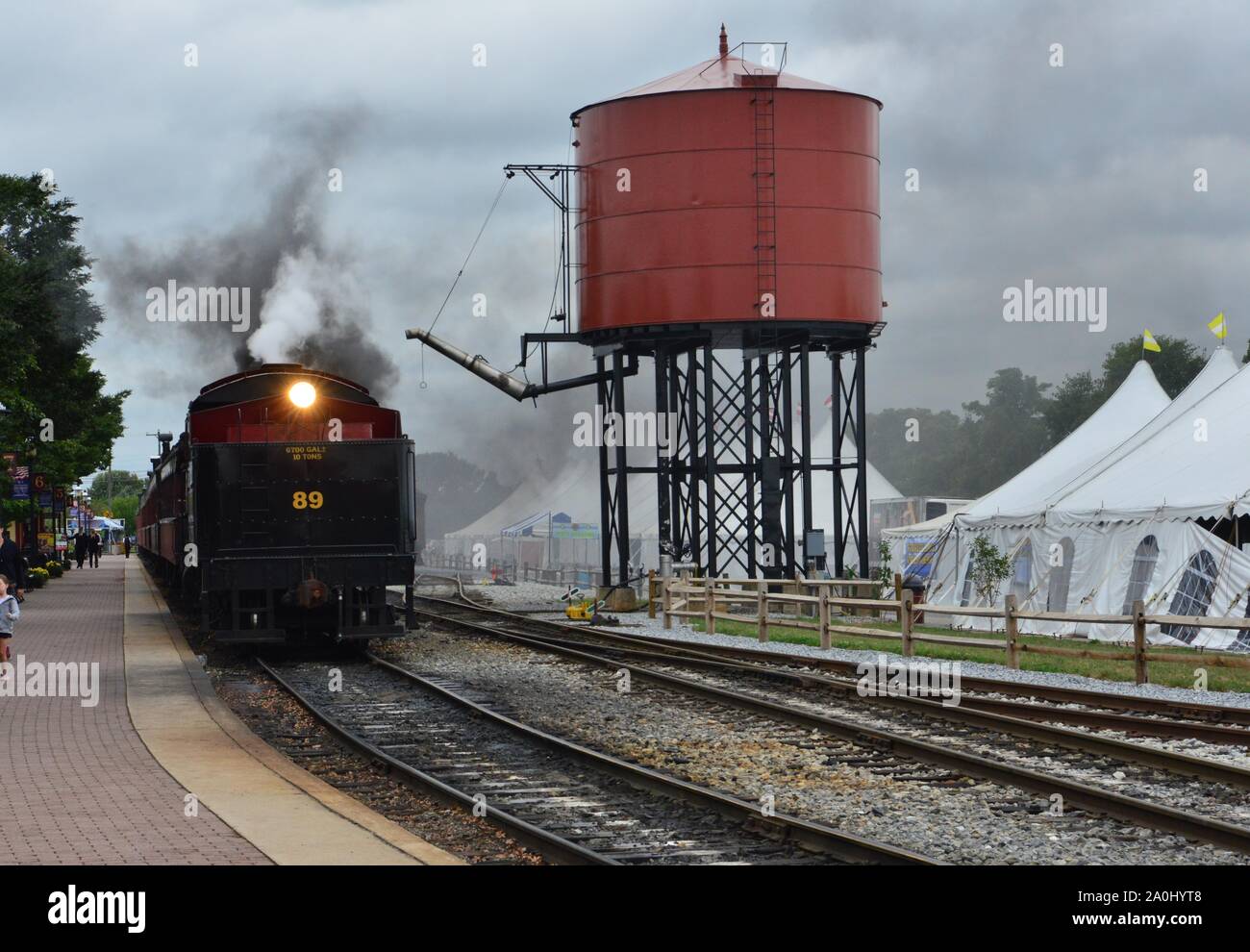 An American steam engine puffing smoke going backwards Stock Photo - Alamy