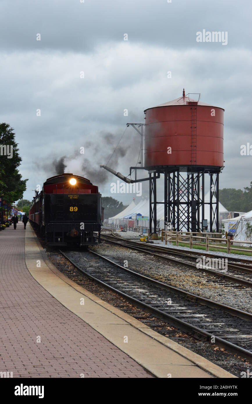 An American steam engine puffing smoke going backwards Stock Photo - Alamy