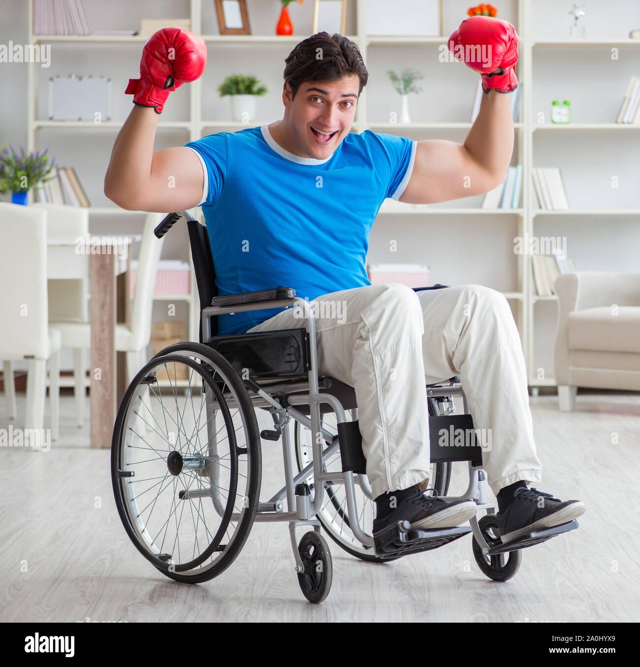 The disabled boxer at wheelchair recovering from injury Stock Photo - Alamy