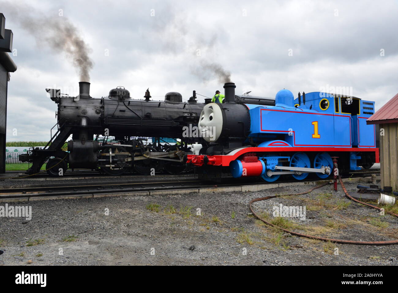 An American steam engine puffing smoke Stock Photo - Alamy