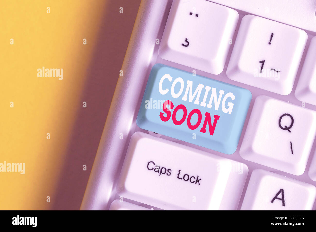 Writing note showing Coming Soon. Business concept for something is ...