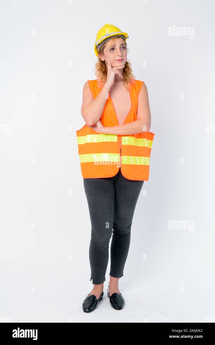 Portrait of beautiful blonde woman construction worker thinking Stock ... Portrait of beautiful blonde woman construction worker thinking Stock ...