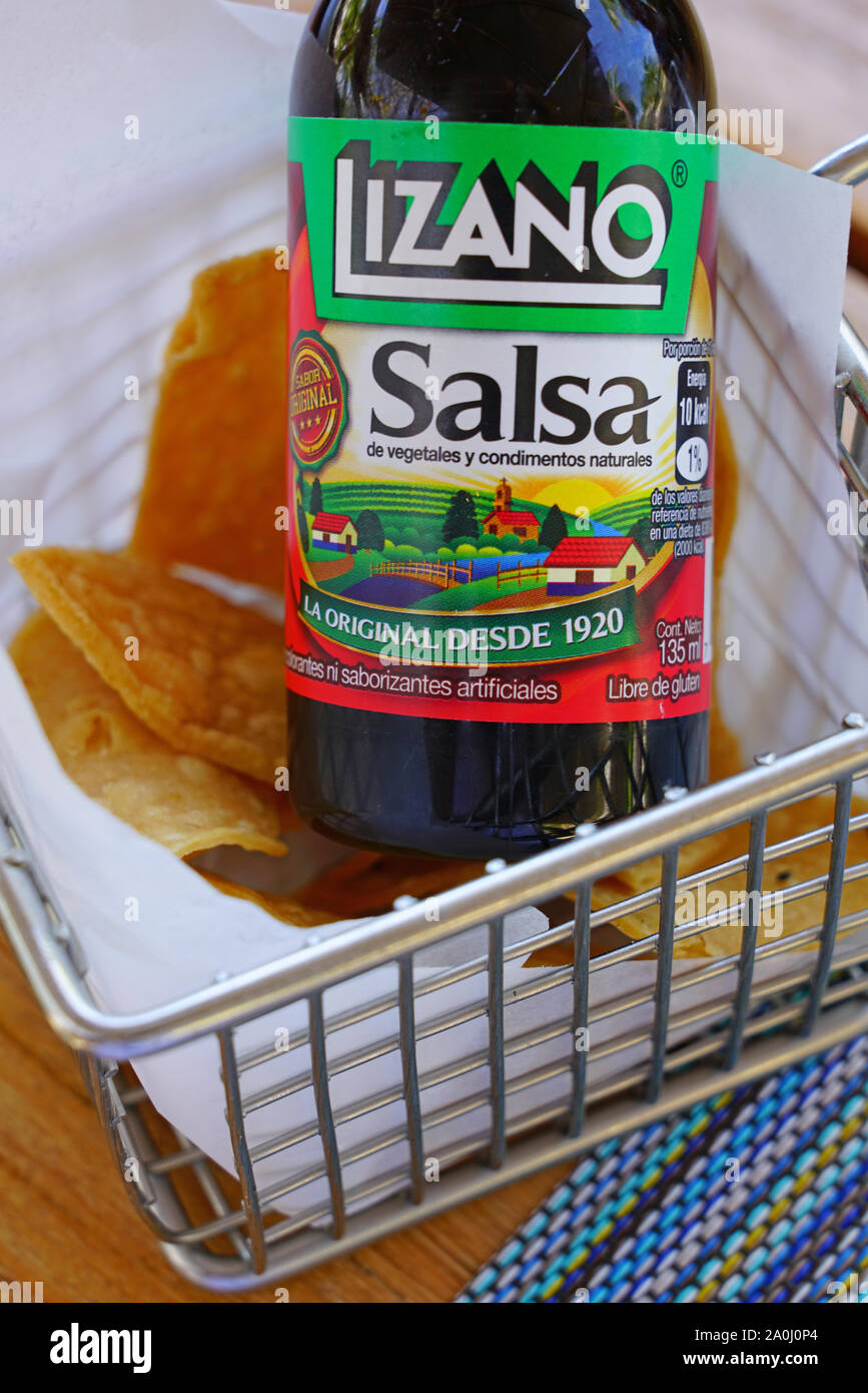 PAPAGAYO, COSTA RICA -20 MAR 2019- View of a bottle of Salsa Lizano ...