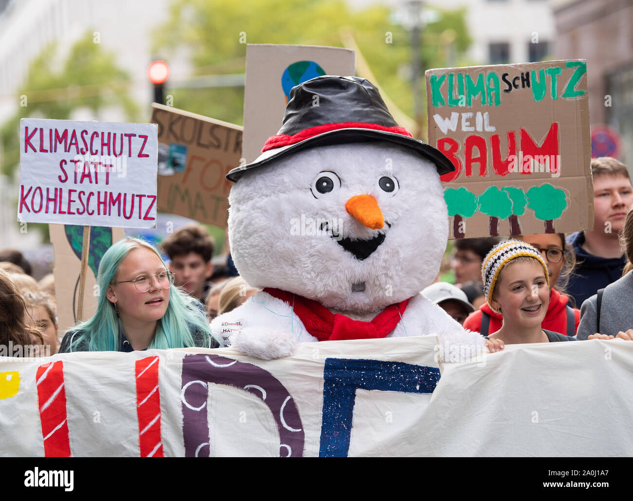 Berlin, Germany. 20th Sep, 2019. A demonstrator dressed as a snowman ...