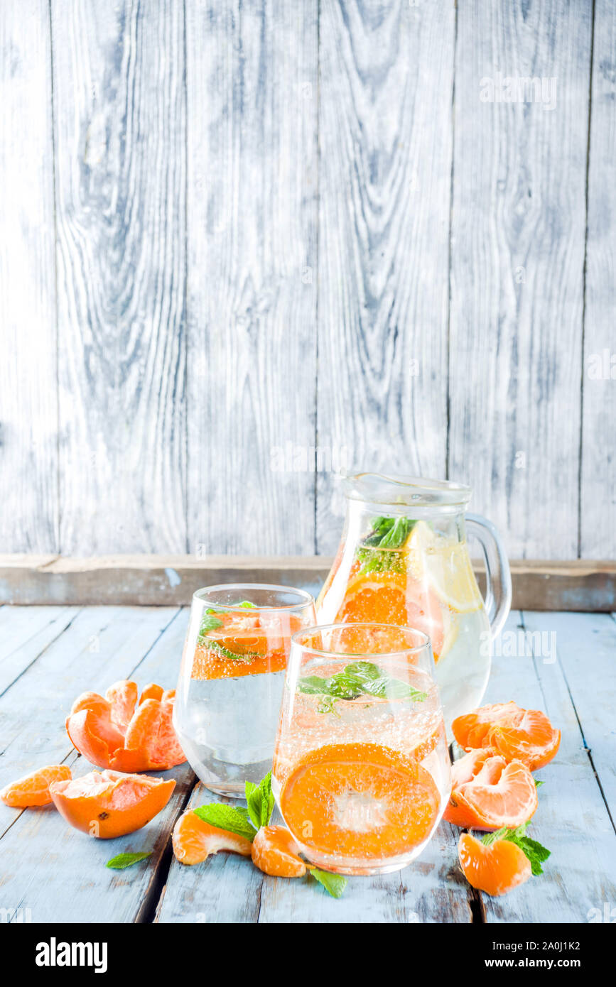 Summer tangerine citrus drink, lemonade or mojito, with fresh ...