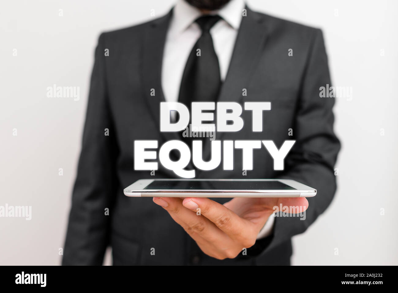 Writing note showing Debt Equity. Business concept for dividing ...