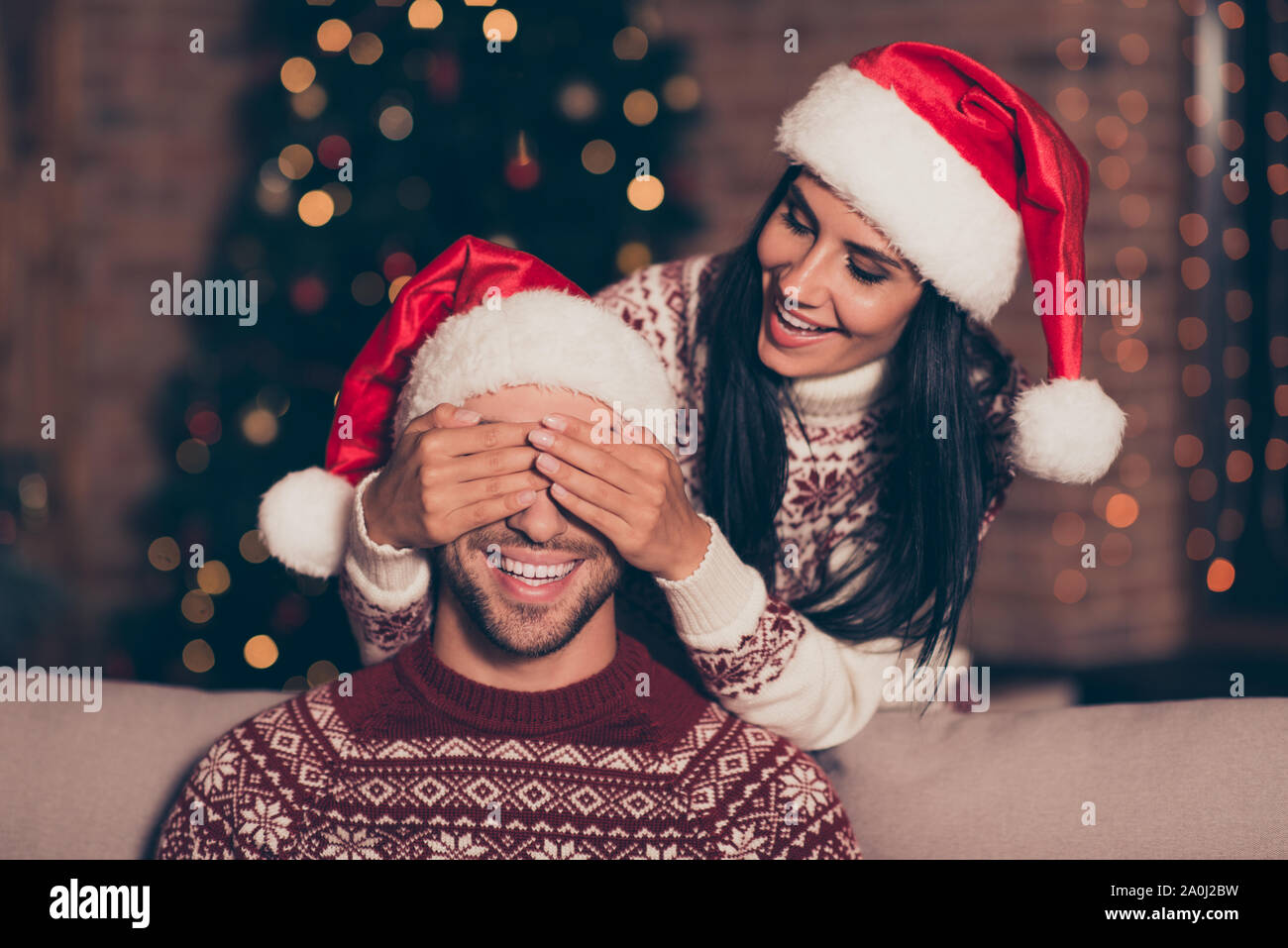 Hide and seek concept. Attractive, happy lady close cover eyes h Stock ...