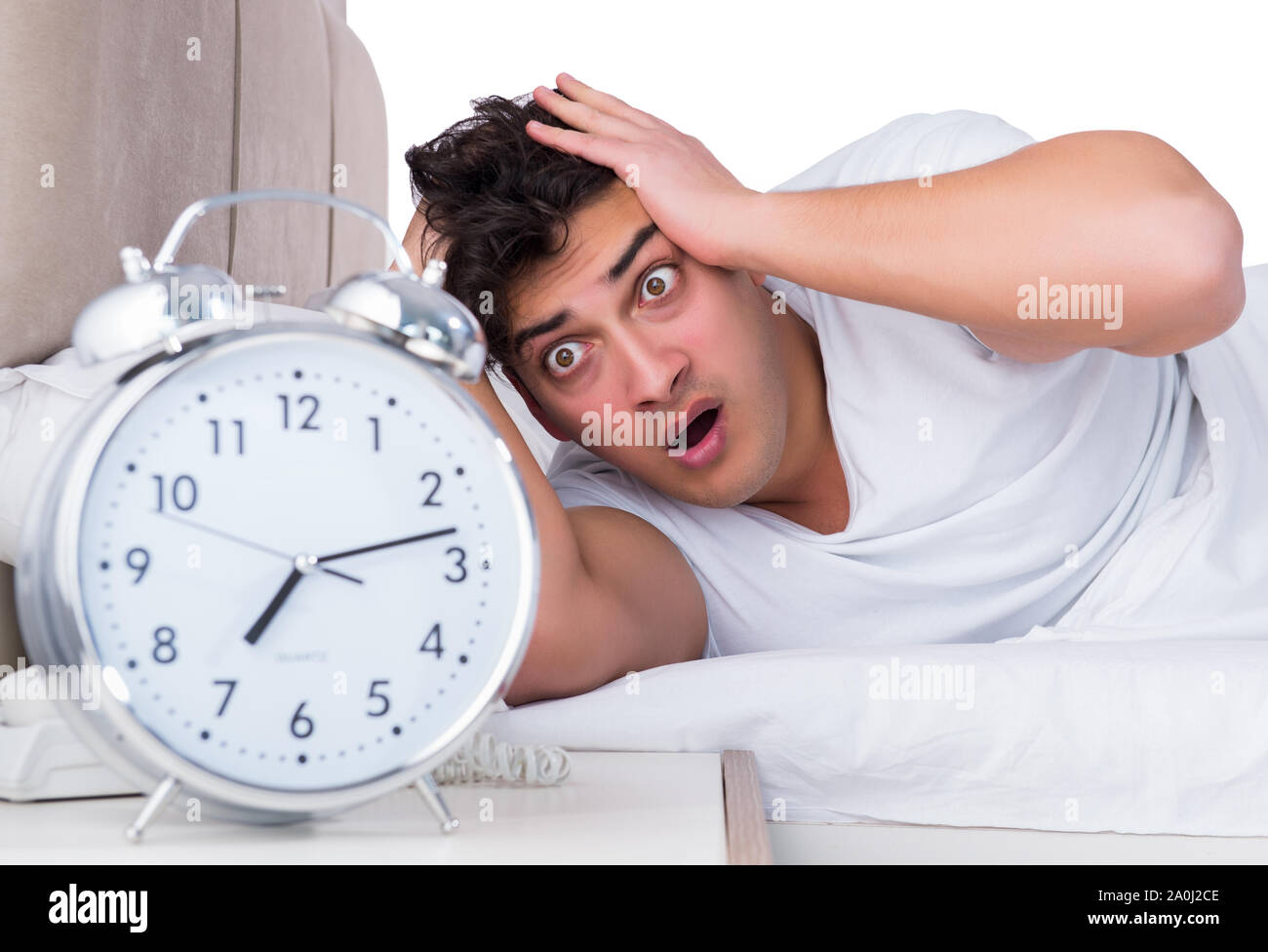 The man in bed suffering from insomnia Stock Photo - Alamy